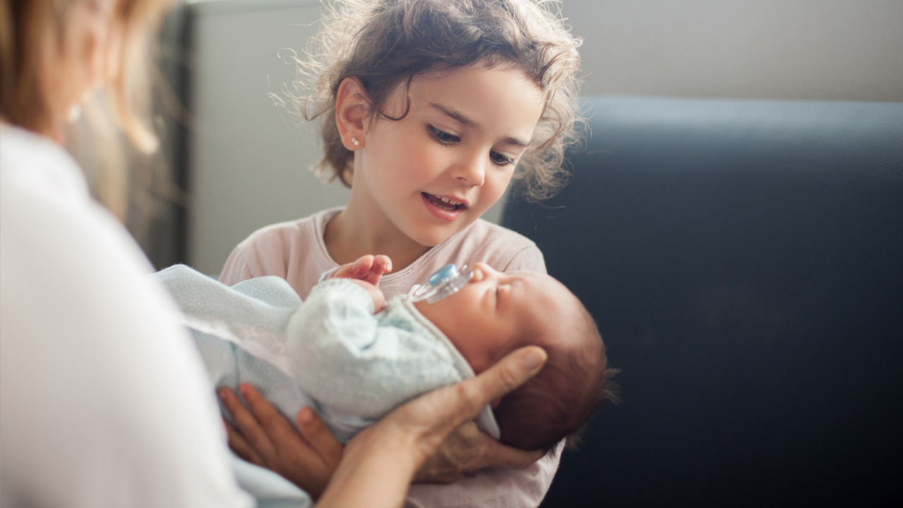 How To Hold An Infant - UsParenting.com